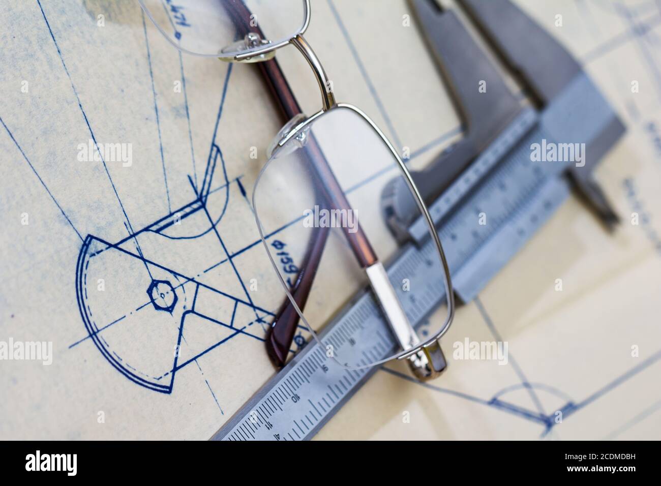 Engineering blueprint with glasses and gauge Stock Photo - Alamy