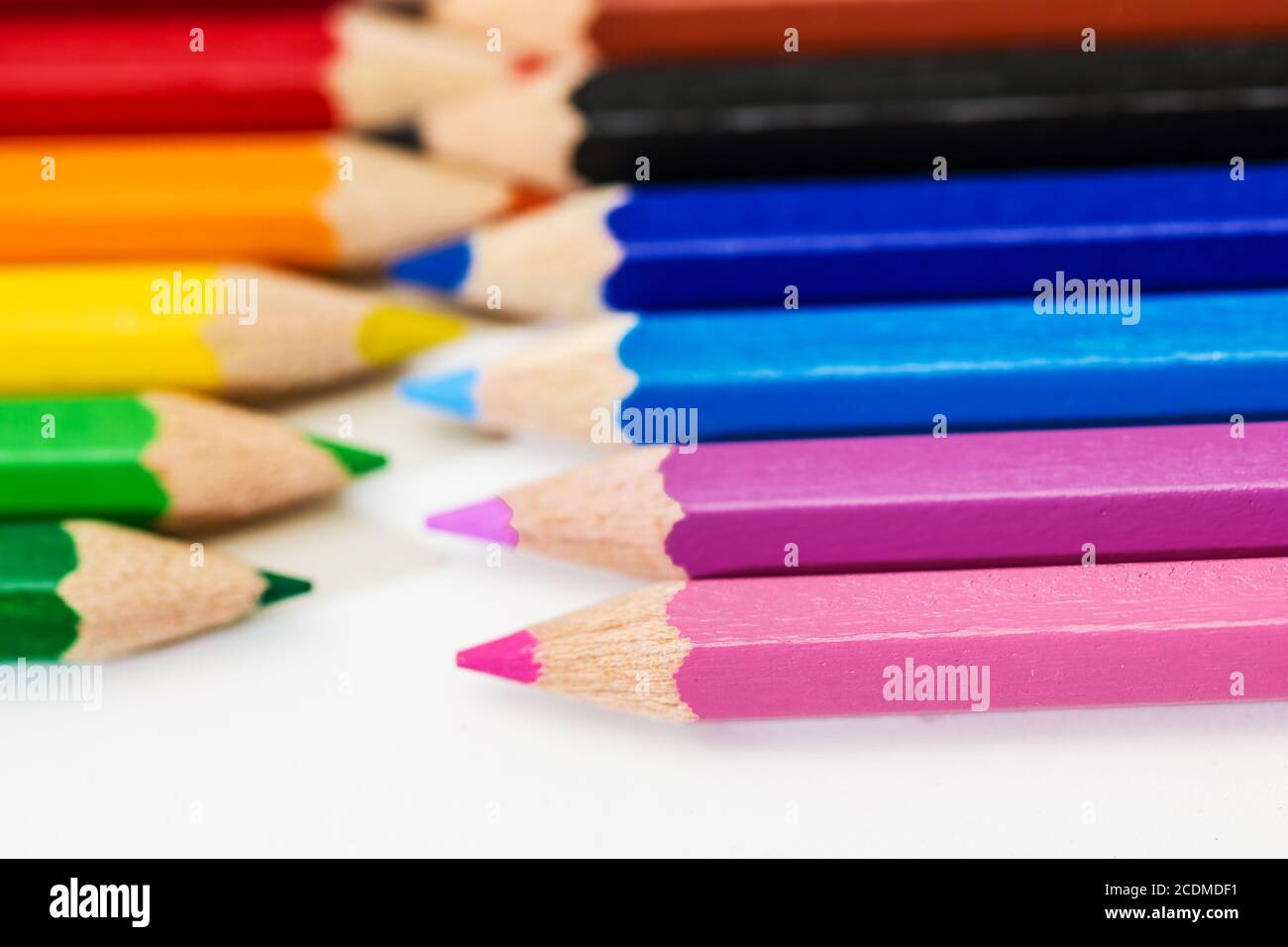 Colorful wooden crayons, pencils Stock Photo - Alamy
