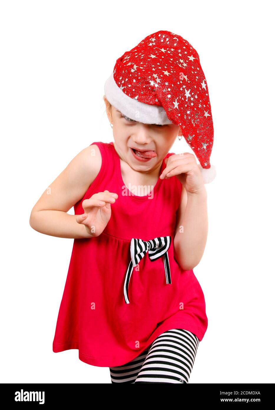 Little Girl in Santa Hat Stock Photo - Alamy