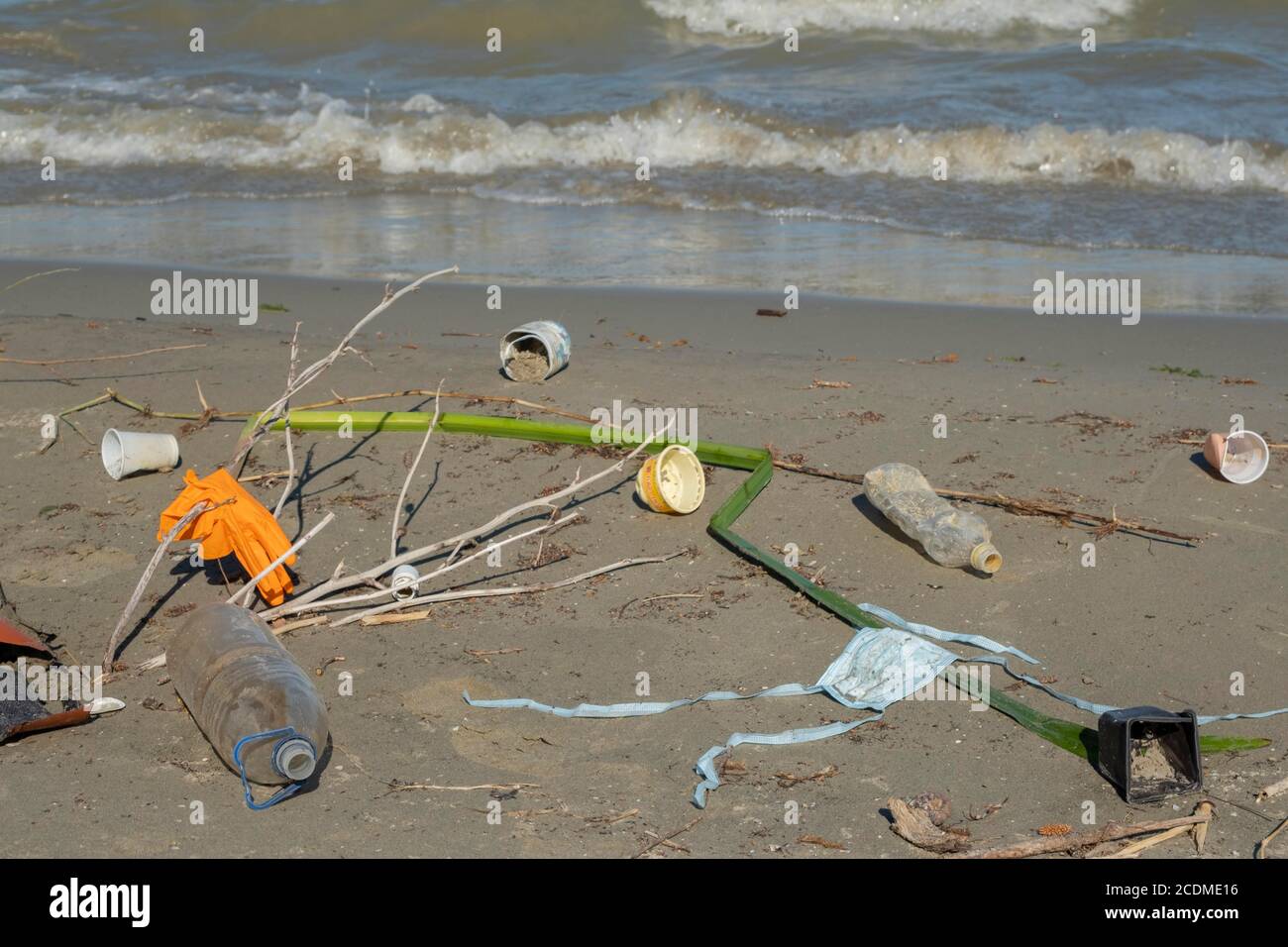 Symbolic image Environmental pollution, plastic waste on the banks of ...