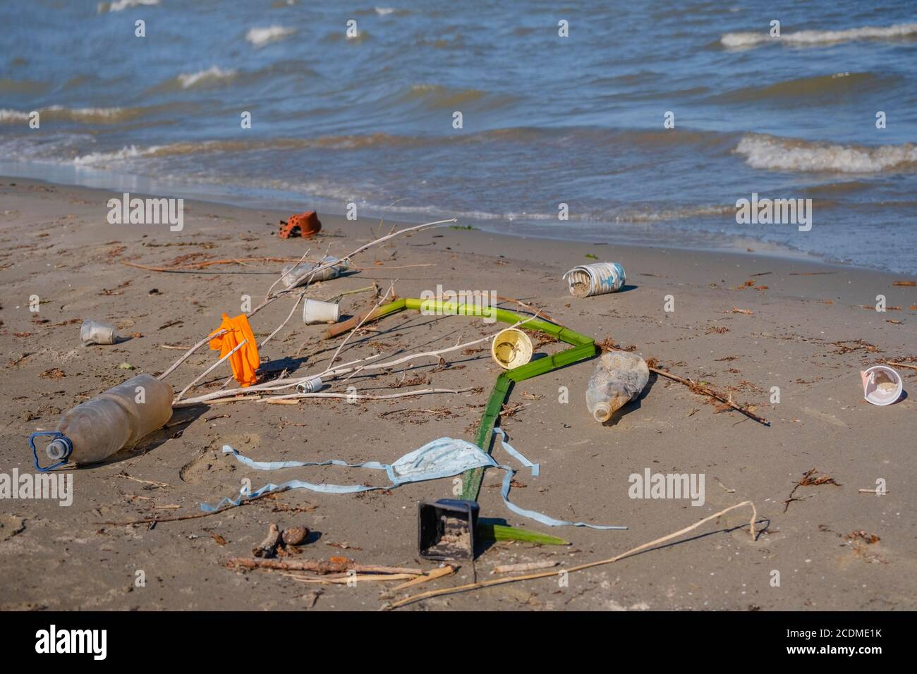 Symbolic image Environmental pollution, plastic waste on the banks of ...