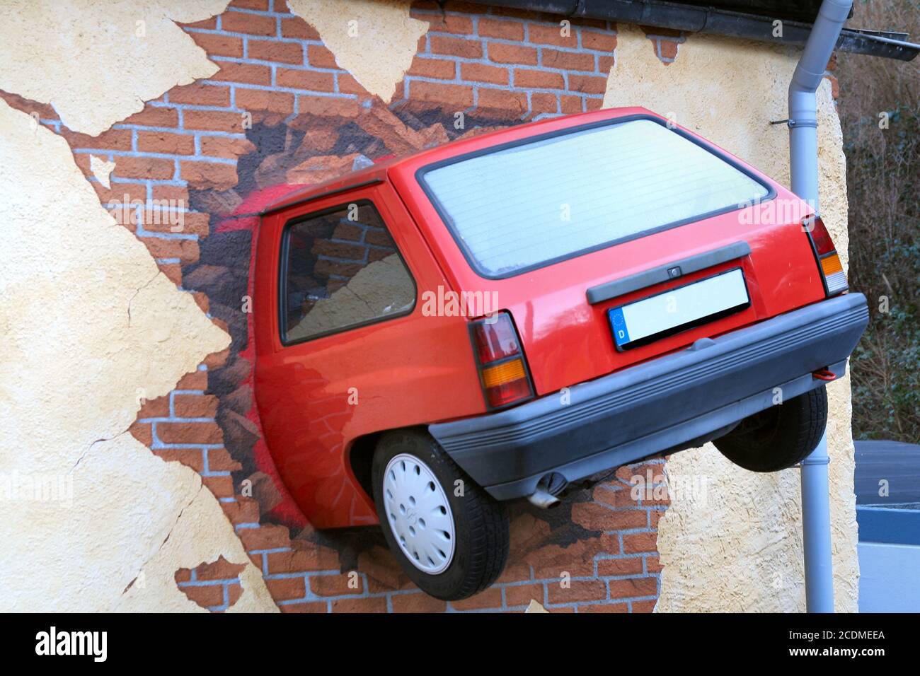 car in the wall, art object, Germany Stock Photo - Alamy