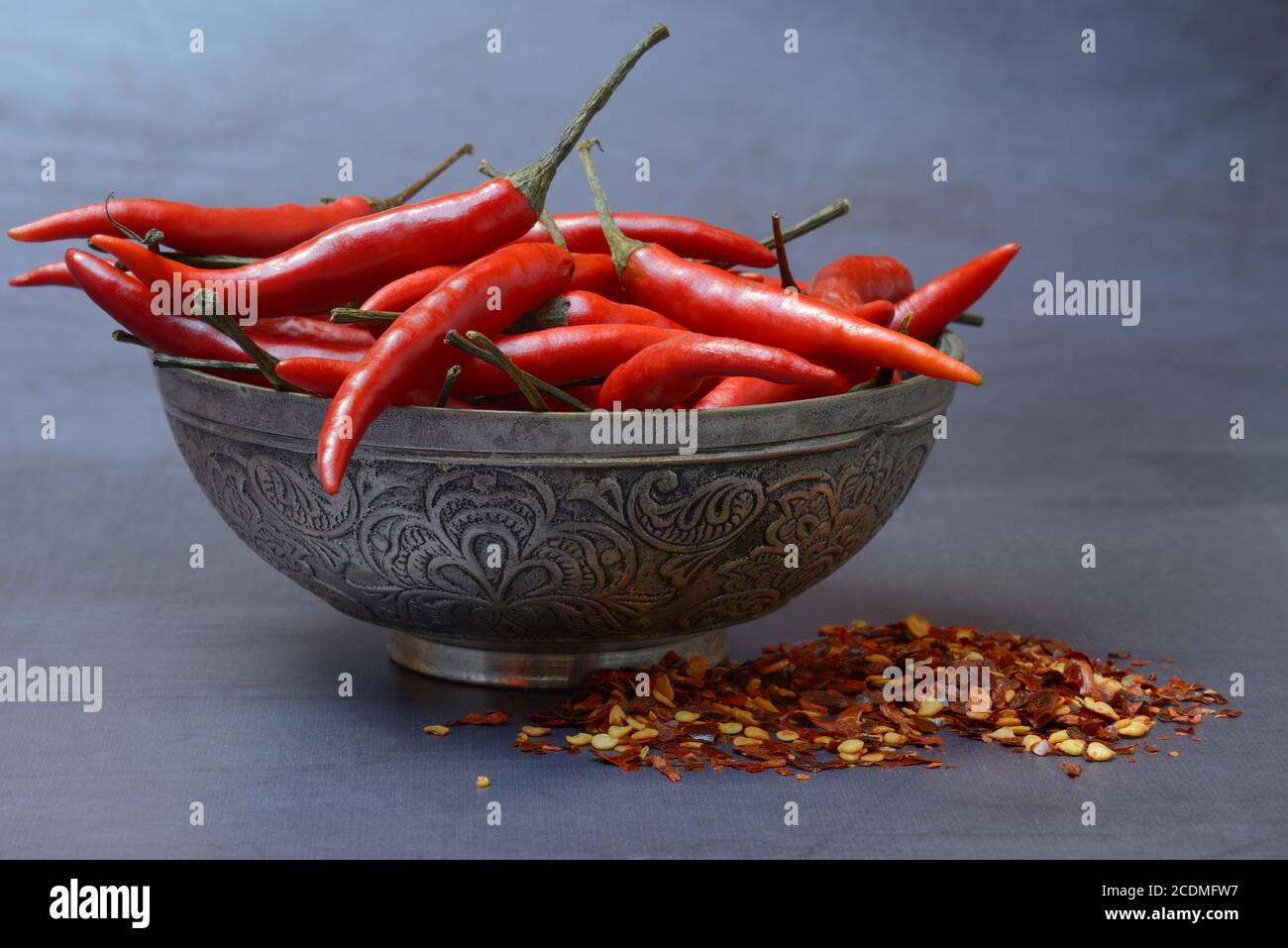 Dried chilli in bowl hi-res stock photography and images - Alamy