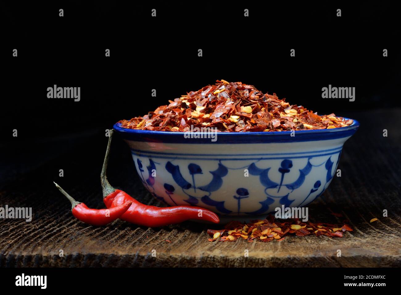 Chili flakes in shell and chilli peppers, Germany Stock Photo - Alamy