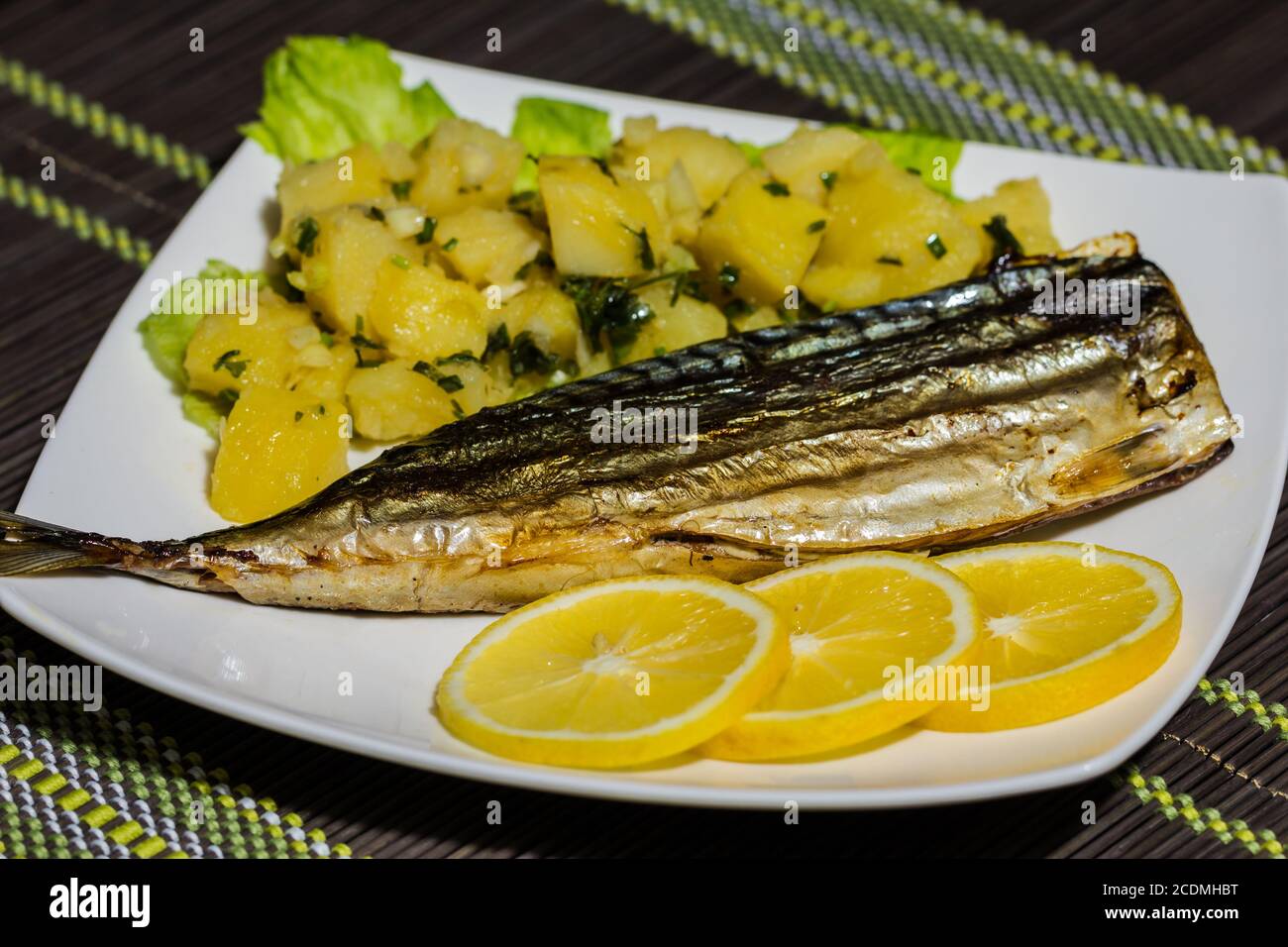 Fresh mackerel fillet with boiled potato and lemon Stock Photo - Alamy