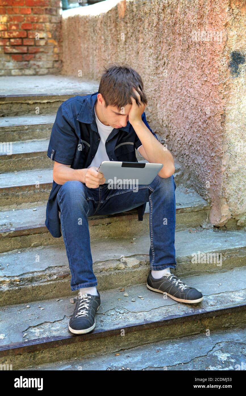 Sad teenager internet hi-res stock photography and images - Alamy