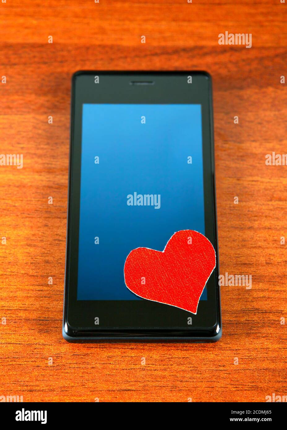 Heart Shape and Cellphone Stock Photo - Alamy