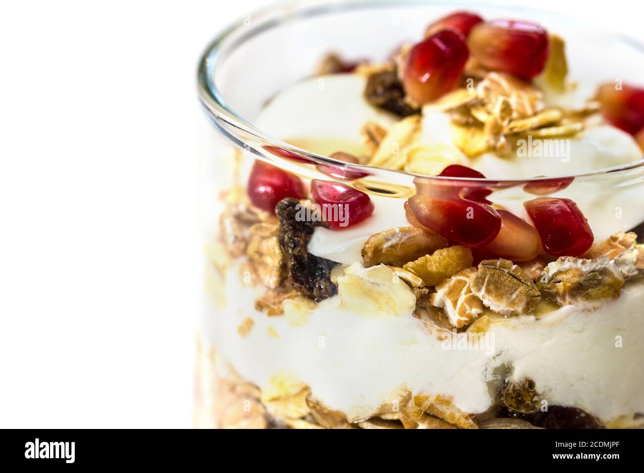 Glass of Muesli with fruits and yogurt isolated on white Stock Photo ...