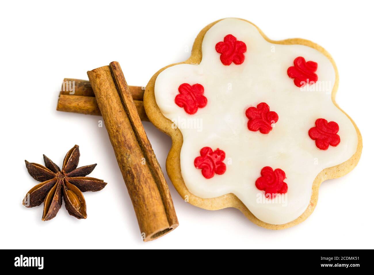 Gingerbread cookies with royal icing in the shape of a flower with star ...