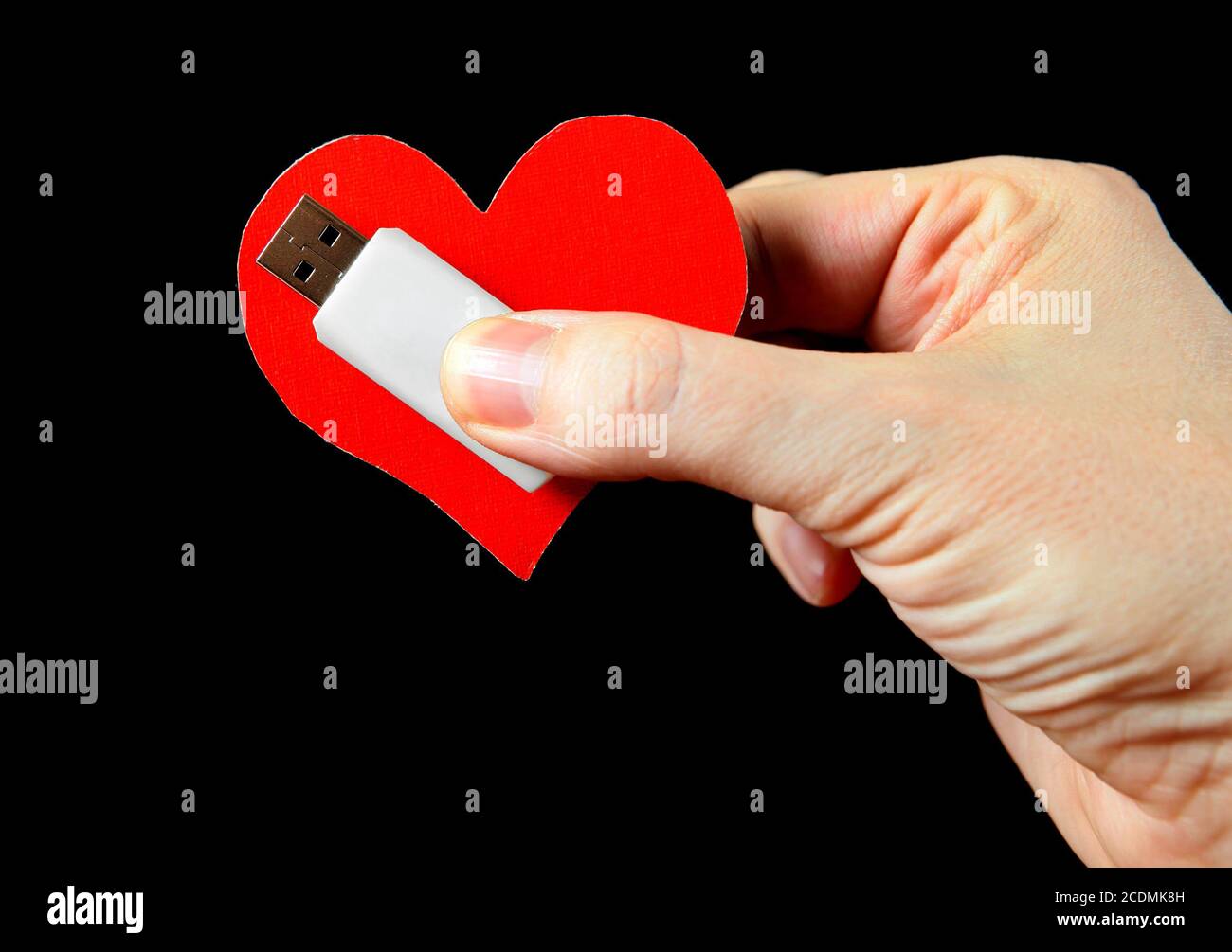 Heart Shape and USB Drive in the Hand Stock Photo - Alamy