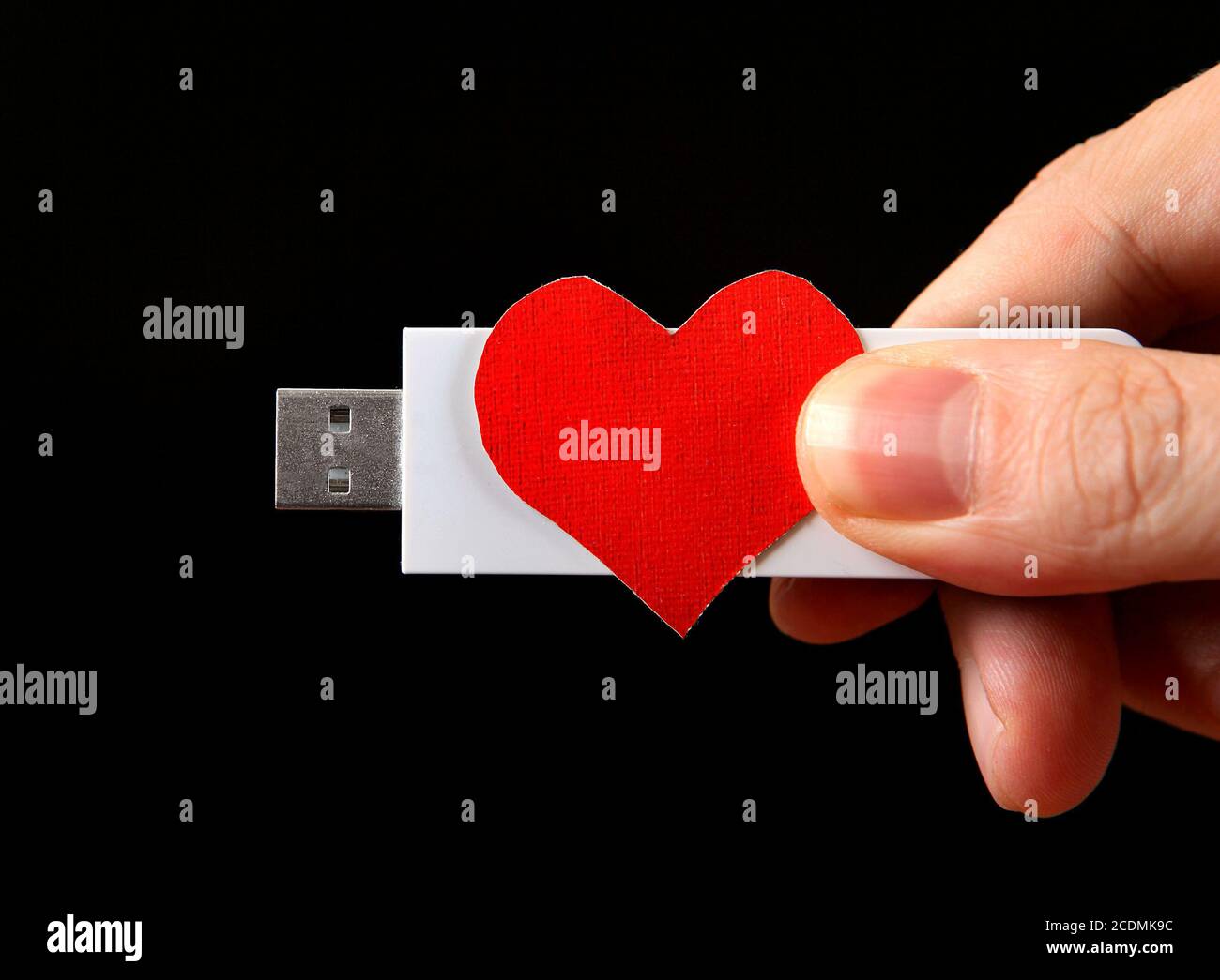 Heart Shape and USB Drive in the Hand Stock Photo - Alamy