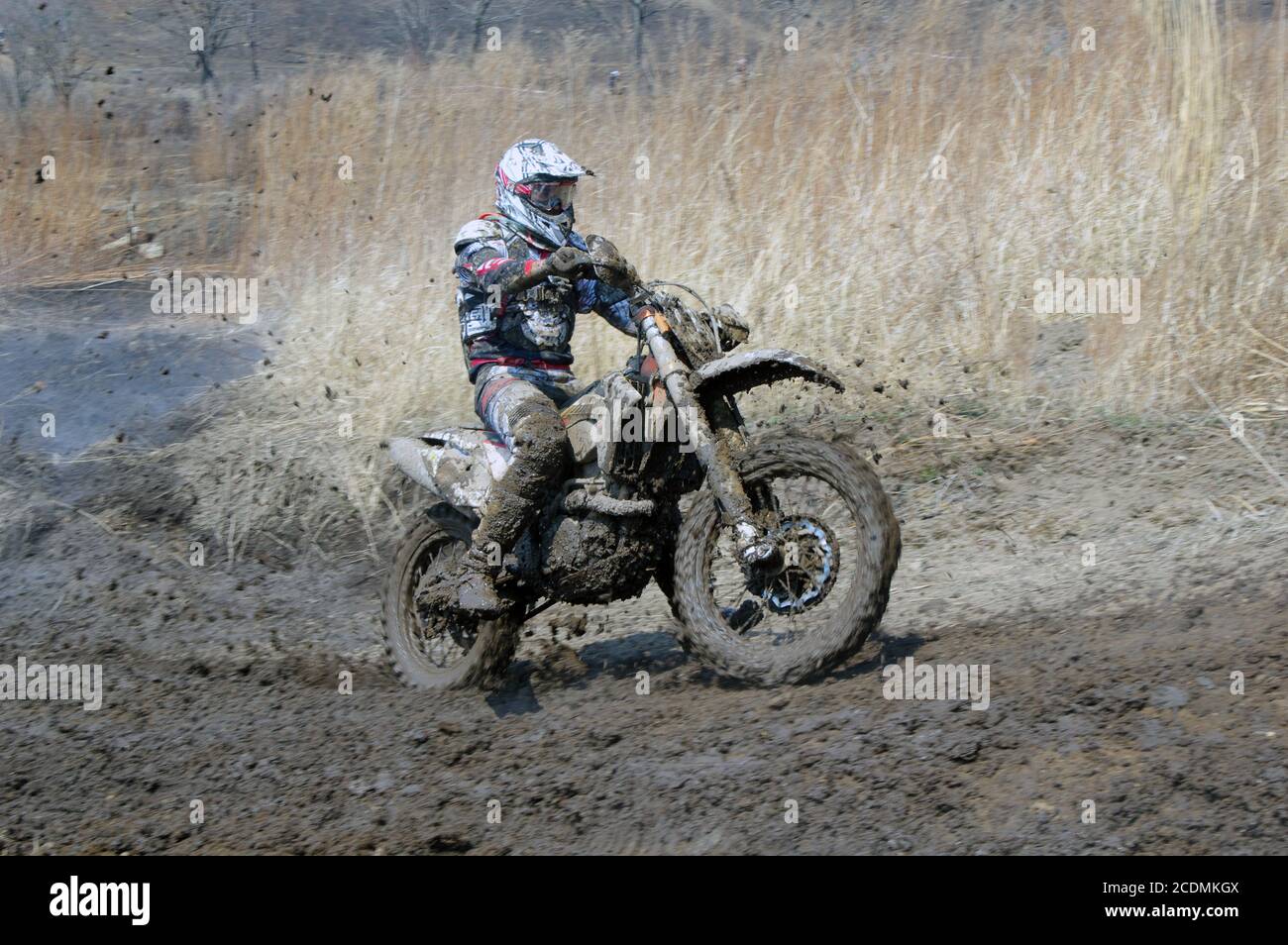Off-road rider is jumping Stock Photo - Alamy