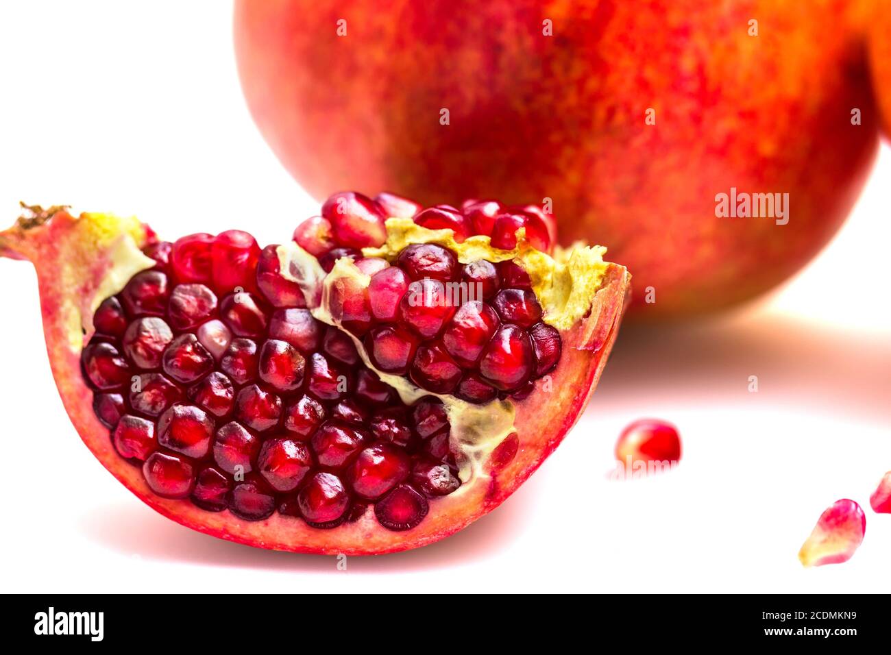 Pomegranate isolated on white background Stock Photo - Alamy