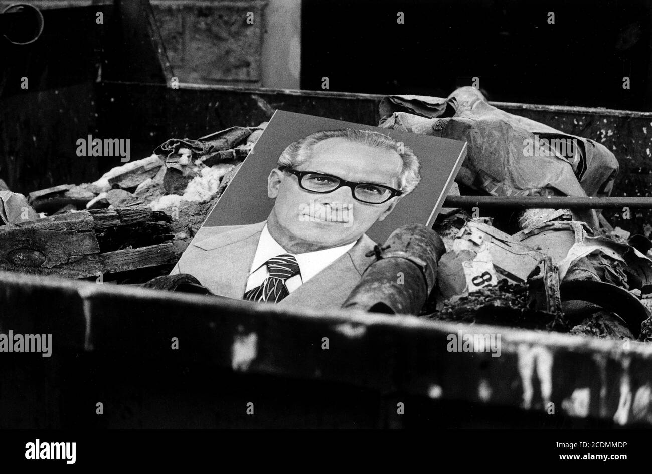 Official honecker portrait in a waste container Black and White Stock ...