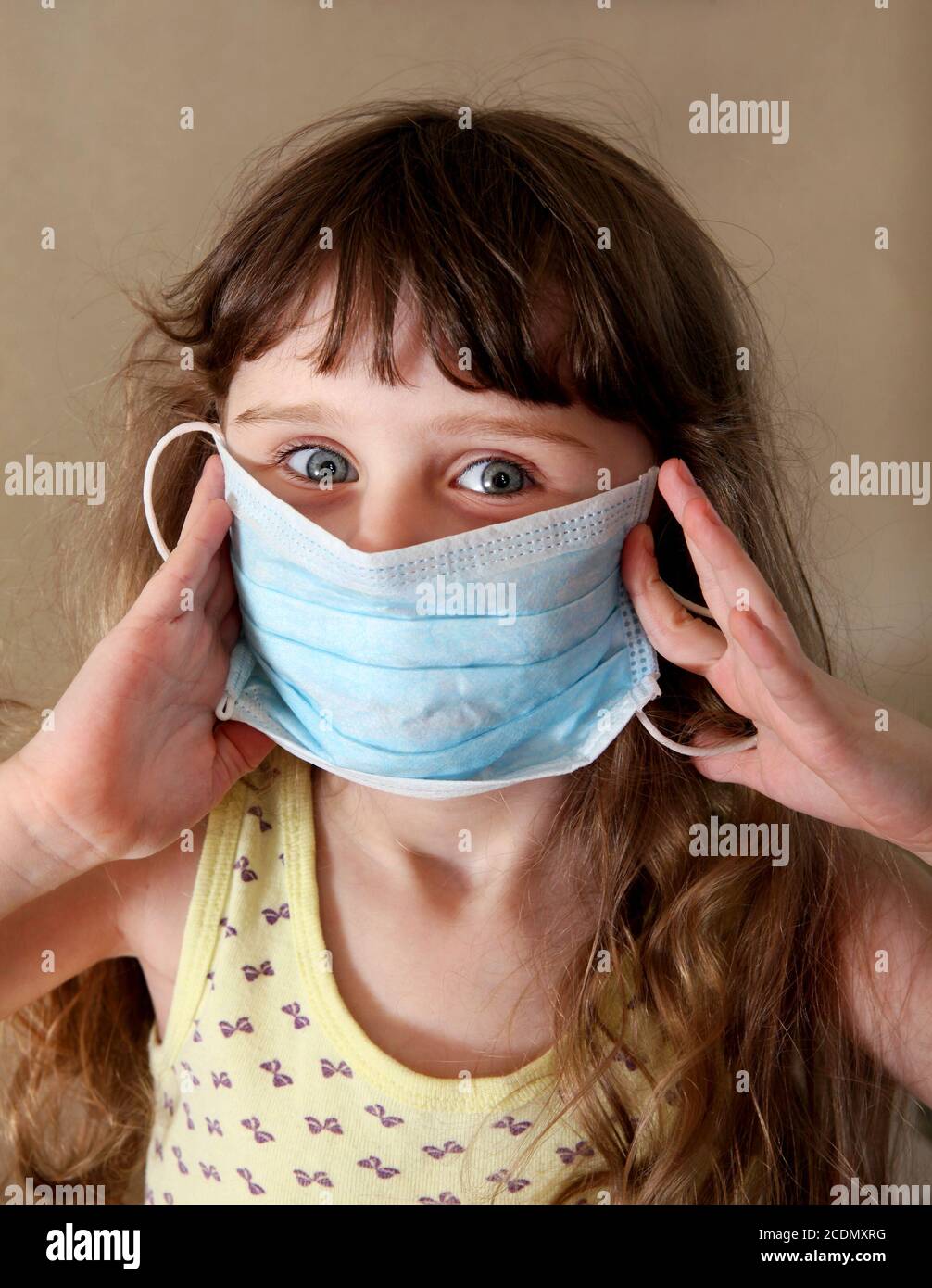 Little Girl in the Flu Mask Stock Photo - Alamy