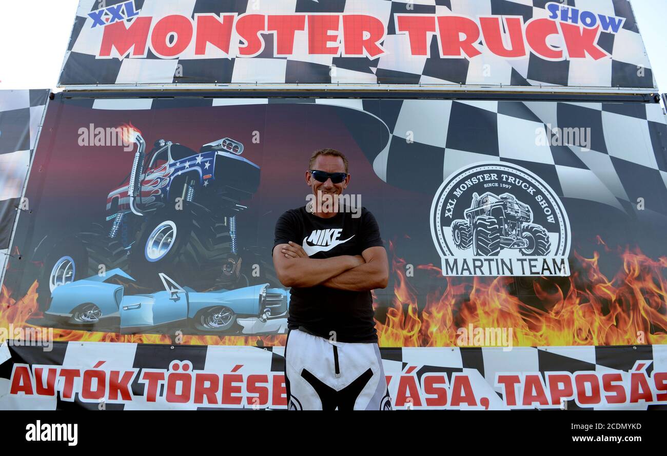 Németh Martin owner of the XXL Monster Truck Show, poses for a photo at ...
