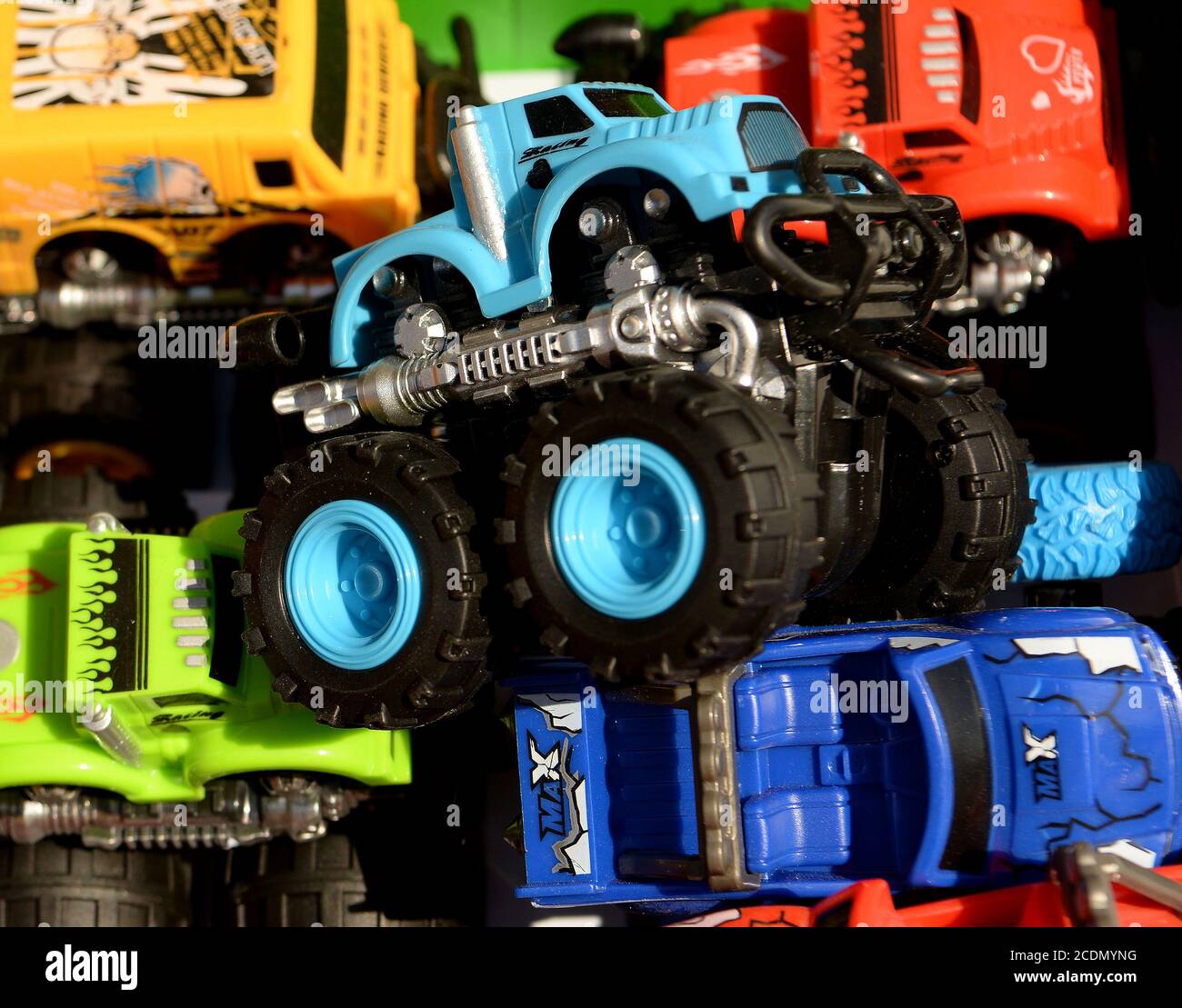 Model monster trucks are being displayed for sale at the XXL Monster ...
