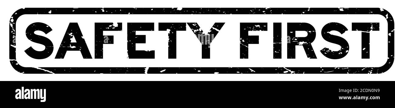 Grunge black safety first square rubber seal stamp on white background ...