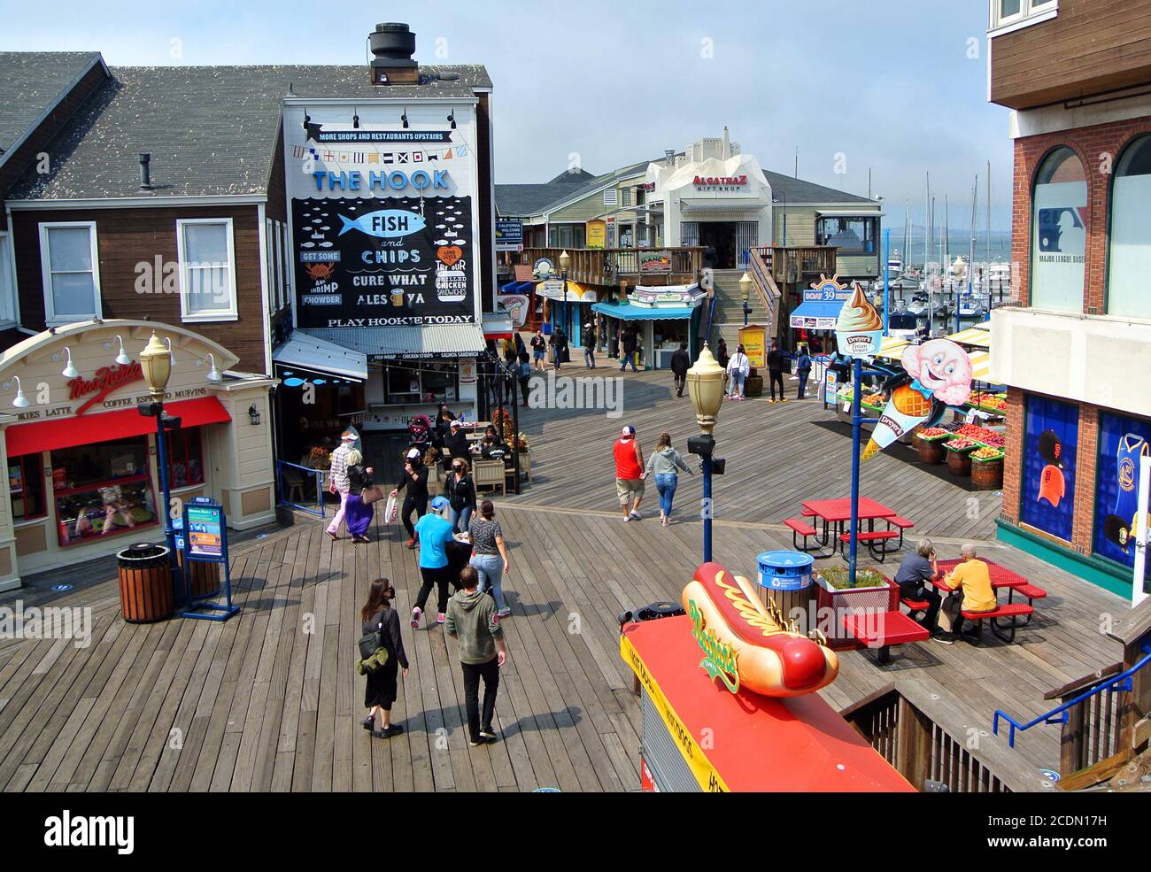 tourists return to pier 39 in august of 2020 during covid 19 wearing ...