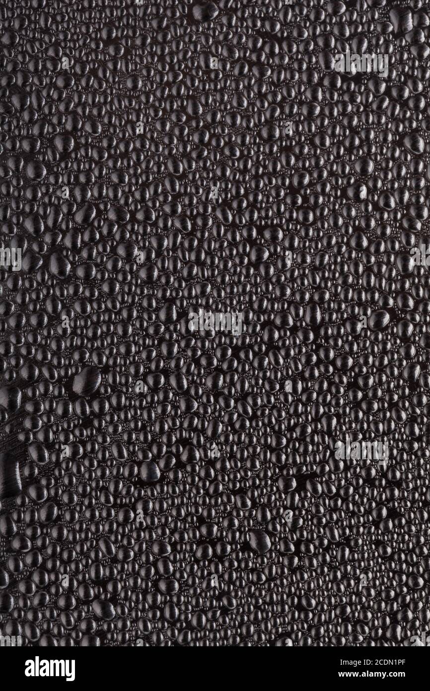 Black drops on surface Stock Photo - Alamy