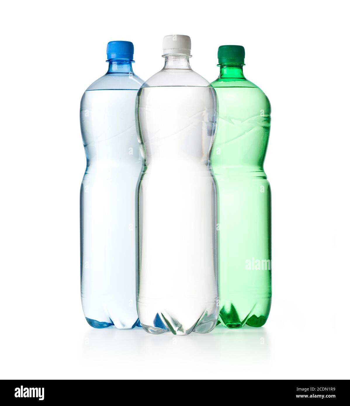 Three bottles of mineral water on a white background with clipping path ...