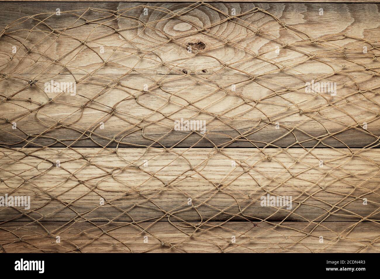 wooden background texture and fishing net Stock Photo - Alamy