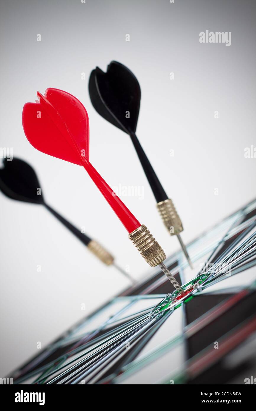 dart hit the dead centre of target Stock Photo - Alamy