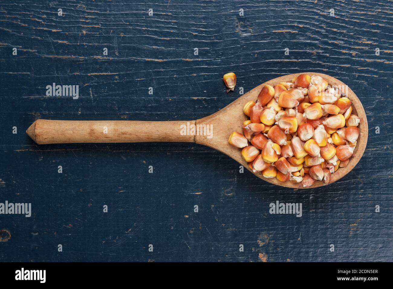 Spoon with corn seeds hi-res stock photography and images - Alamy