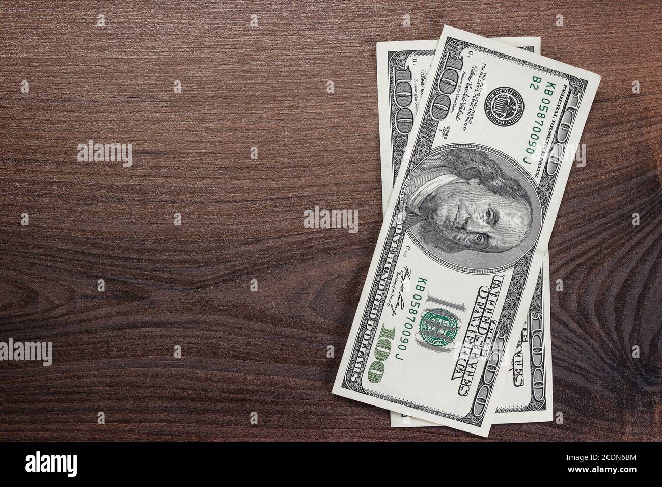 two hundred dollars banknotes background Stock Photo - Alamy