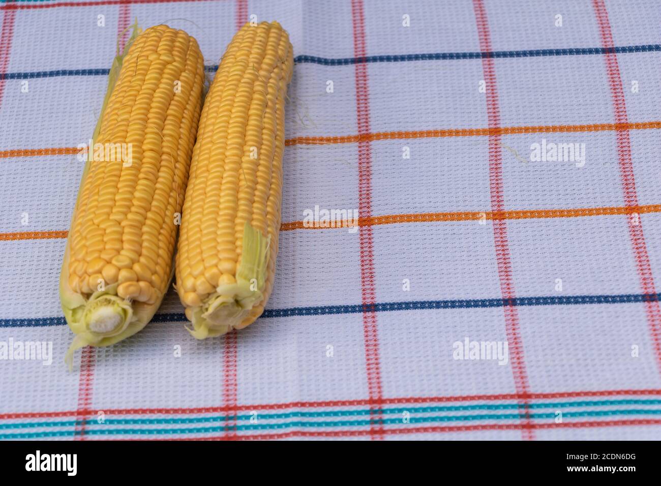 Fresh uncooked corn conception hi-res stock photography and images - Alamy