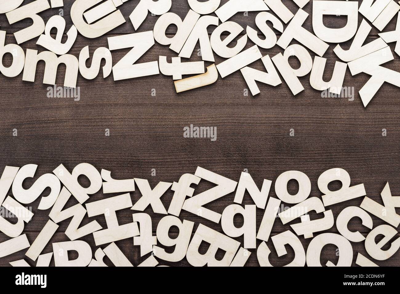 uppercase and lowercase wooden letters background Stock Photo - Alamy