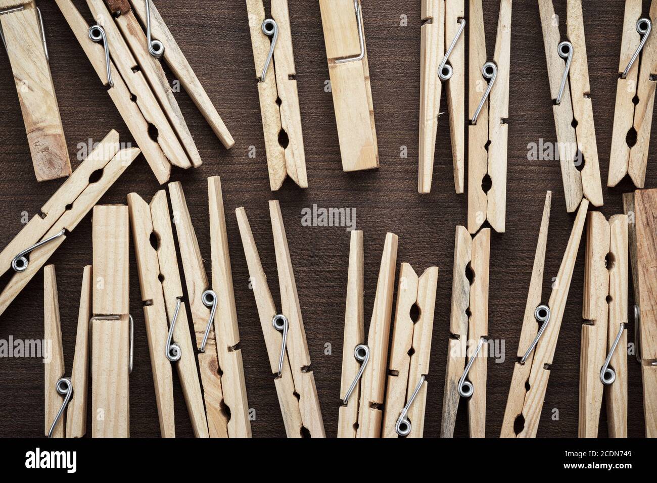 wooden clothes pegs on the table Stock Photo - Alamy
