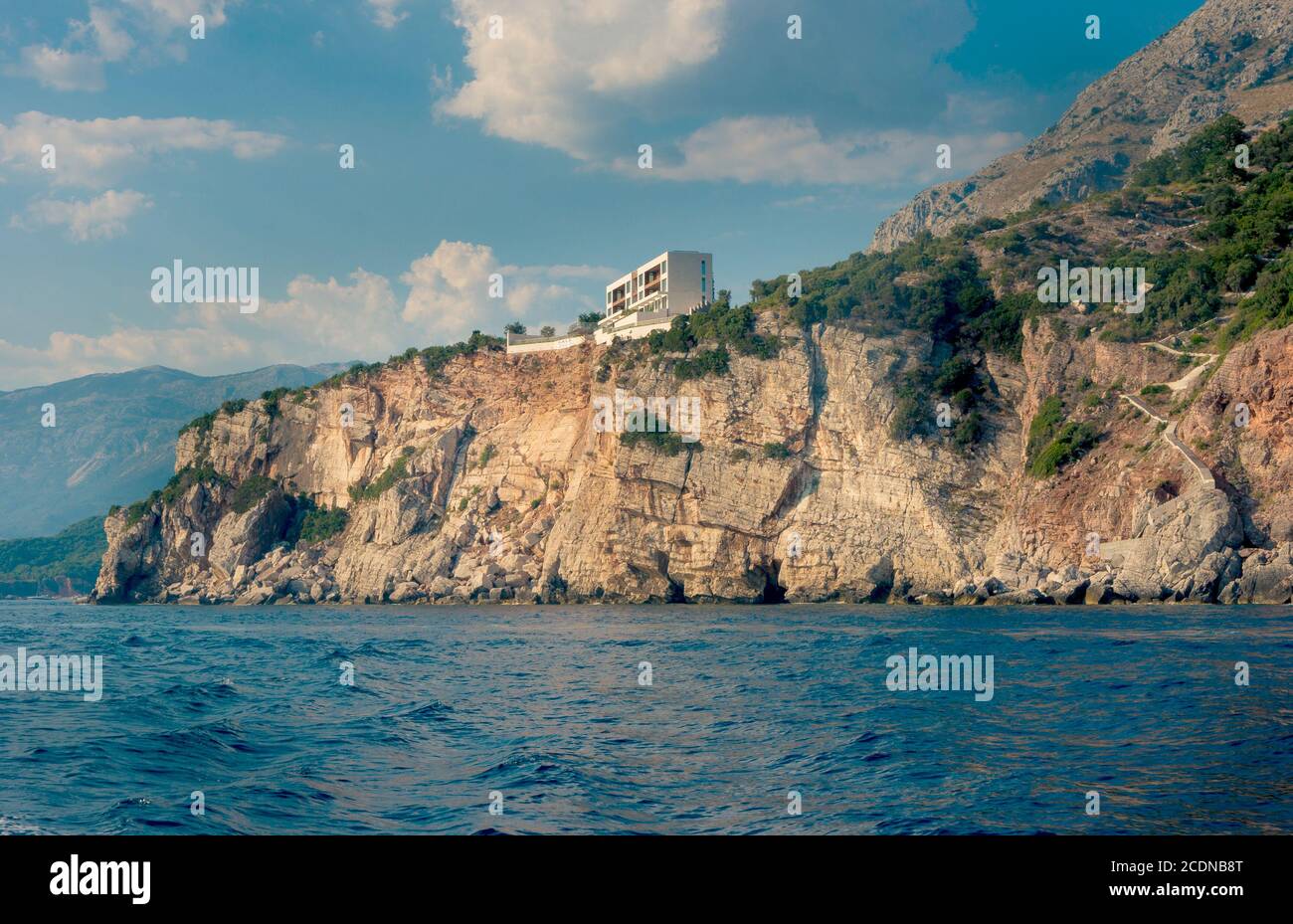 The high cliffs next to the central beach of Budva Stock Photo - Alamy