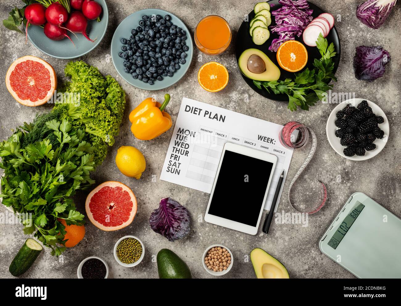 Set of diet food Tablet computer with blank screen and weight loss ...