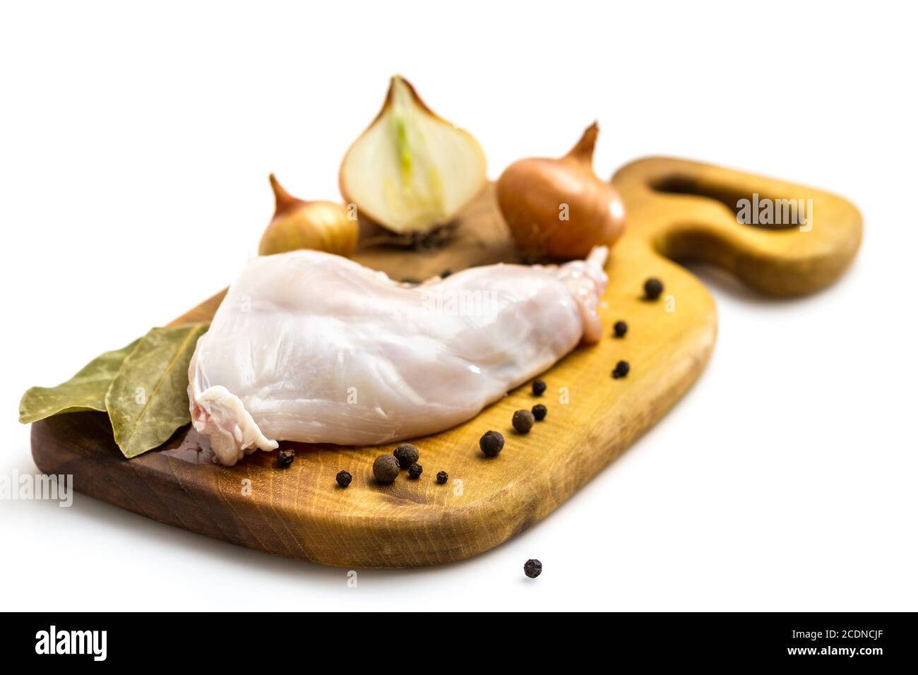 Raw rabbit with black pepper and allspice Stock Photo - Alamy