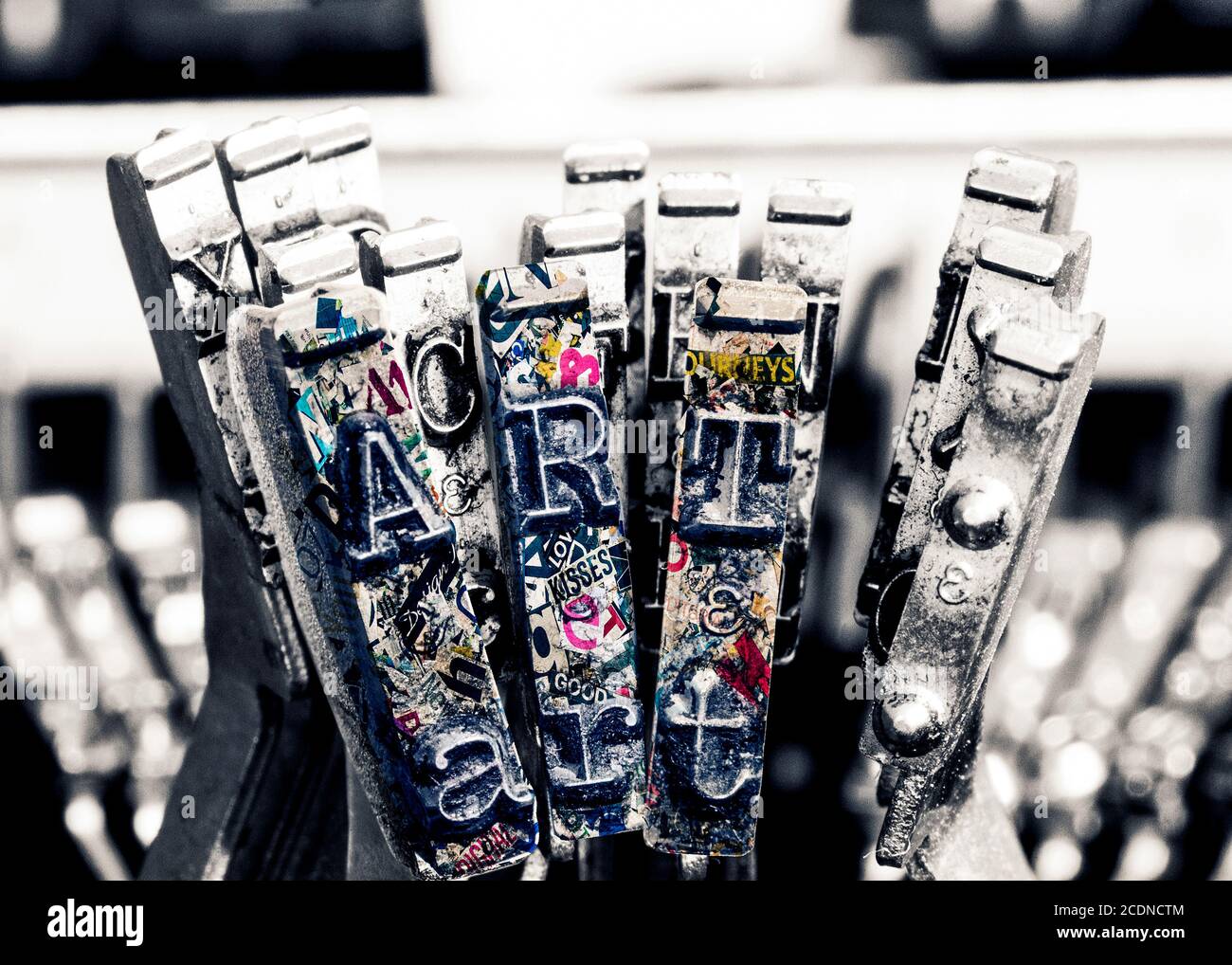 the word ART with old typewriter hammers in monochrome Stock Photo - Alamy