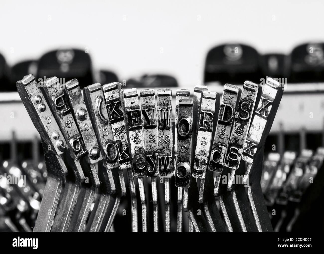the word KEYWORDS with old typewriter hammers Stock Photo - Alamy