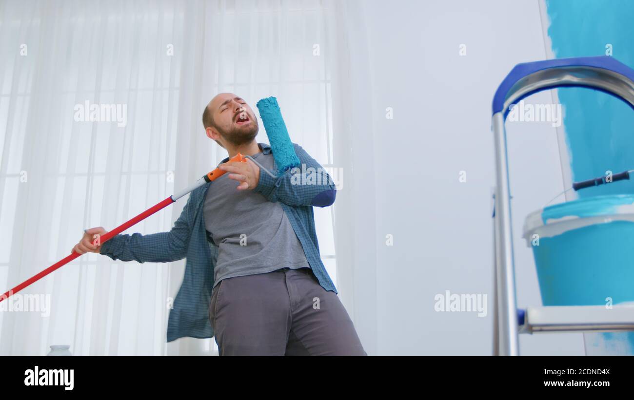 Man excitement during home repair. Apartment redecoration and home ...