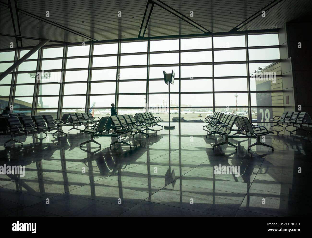 airport waiting area , seats and outside the window scene Stock Photo ...