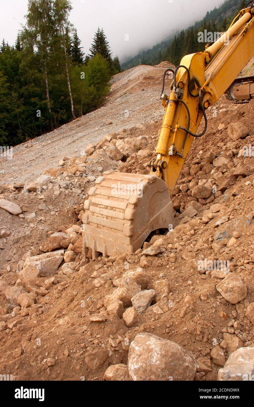 Digger in action Stock Photo - Alamy