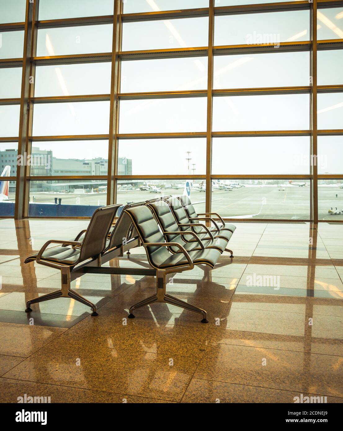 airport waiting area , seats and outside the window scene Stock Photo ...