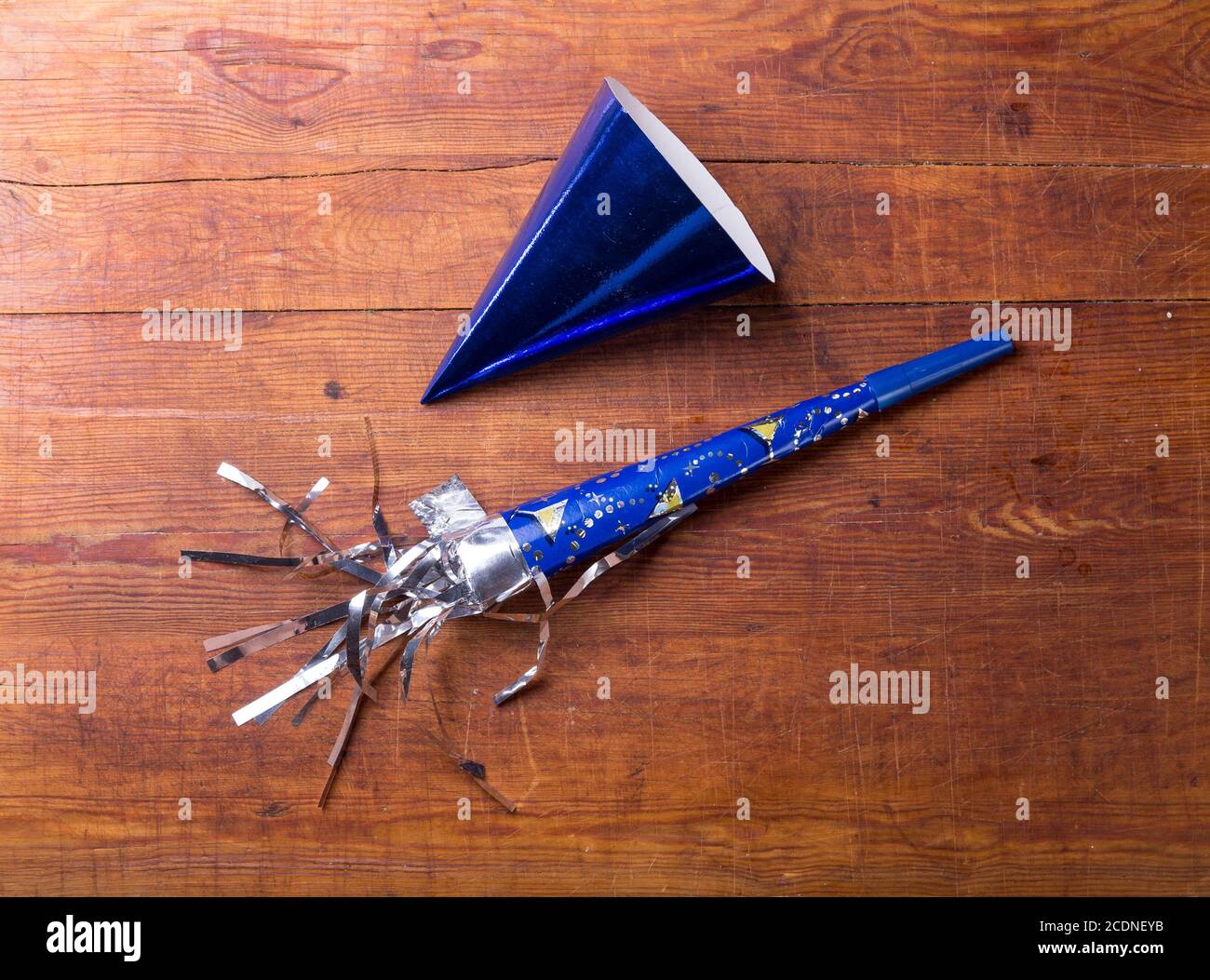 party hat on wood table. birthday background Stock Photo - Alamy