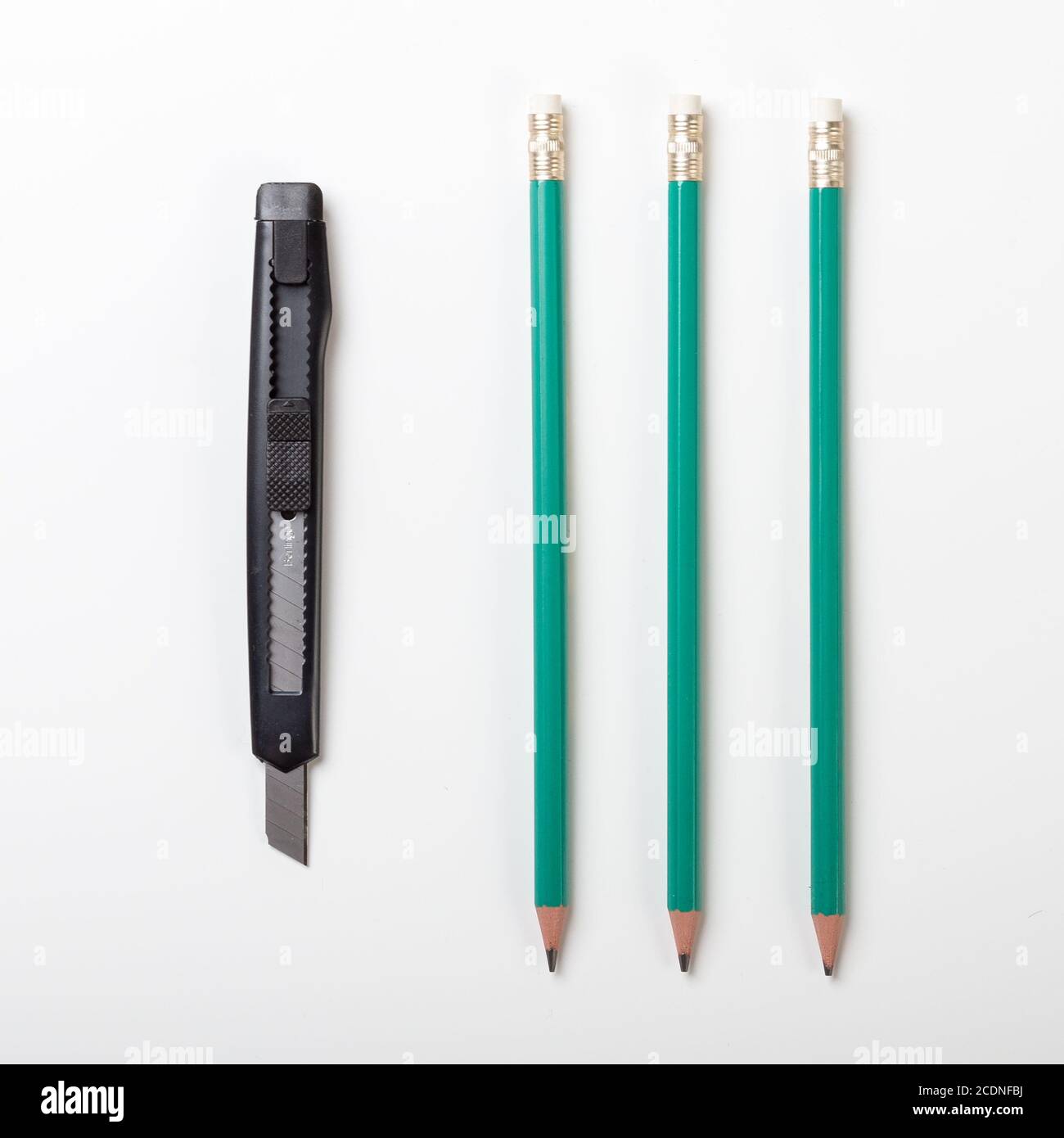 Three pencils with a cutter, isolated on white background Stock Photo ...