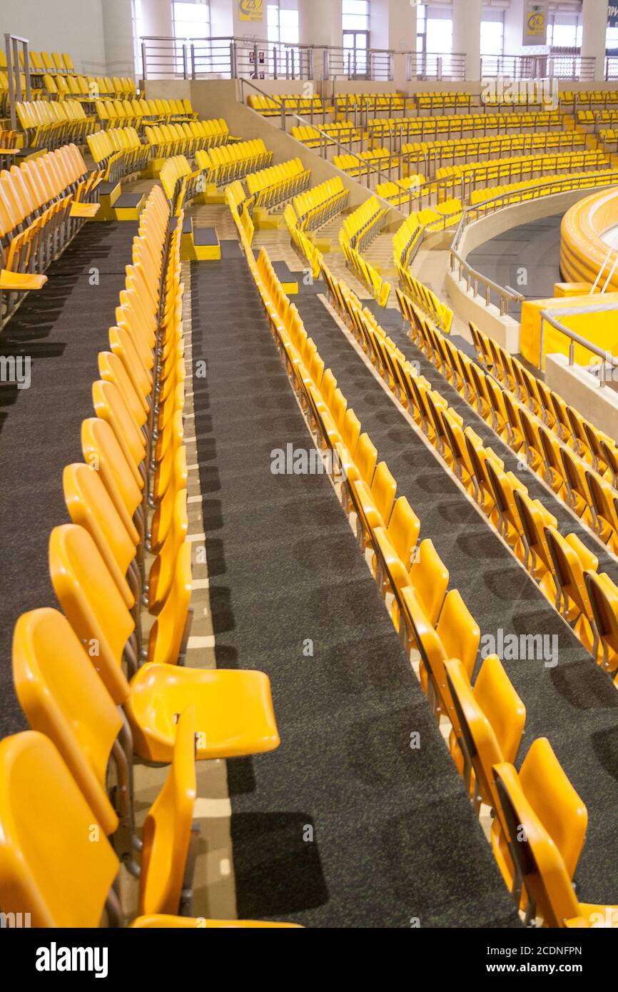Yellow seat in the stadium Stock Photo - Alamy