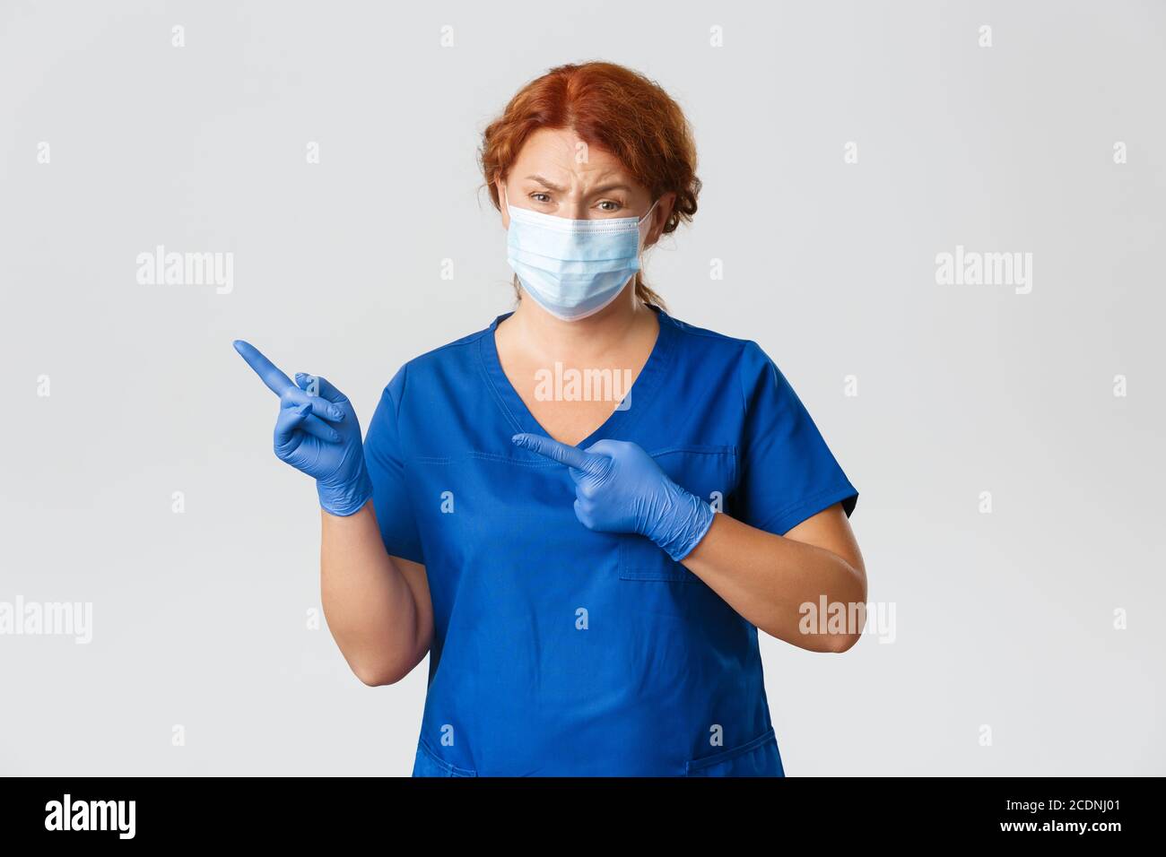 Medical workers, covid-19 pandemic, coronavirus concept. Skeptical and ...