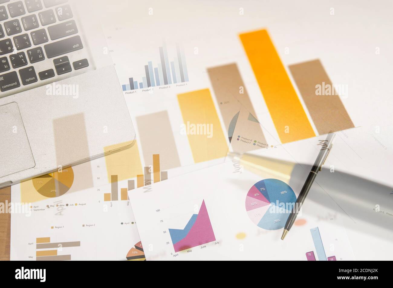 Graphs and pen Stock Photo - Alamy