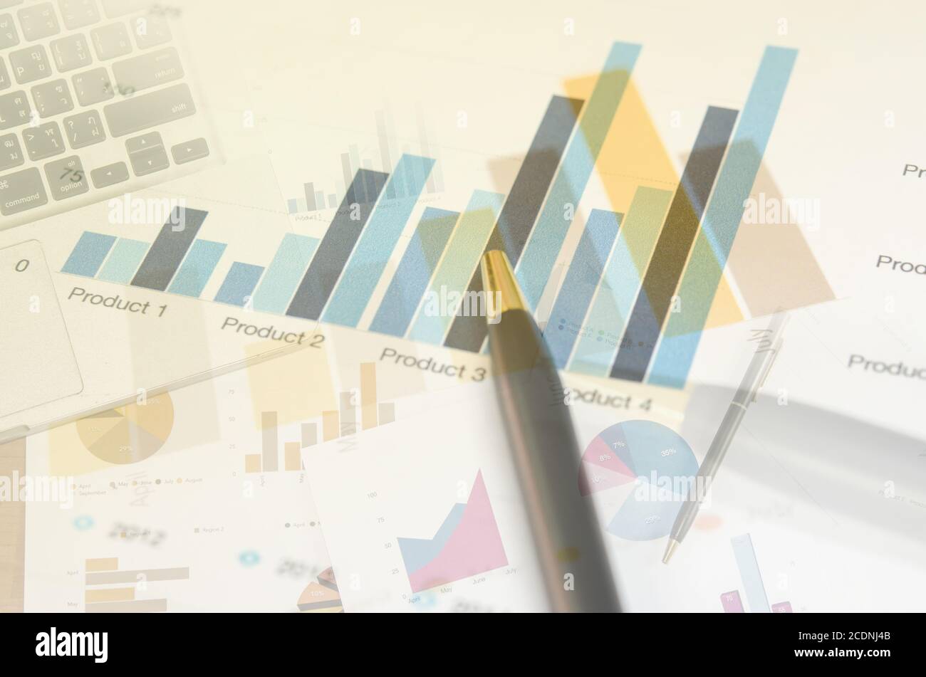 Graphs and pen Stock Photo - Alamy