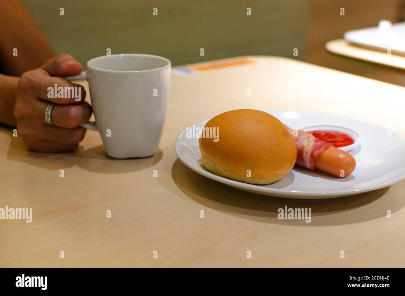 Coffee, bread and sausage Stock Photo - Alamy