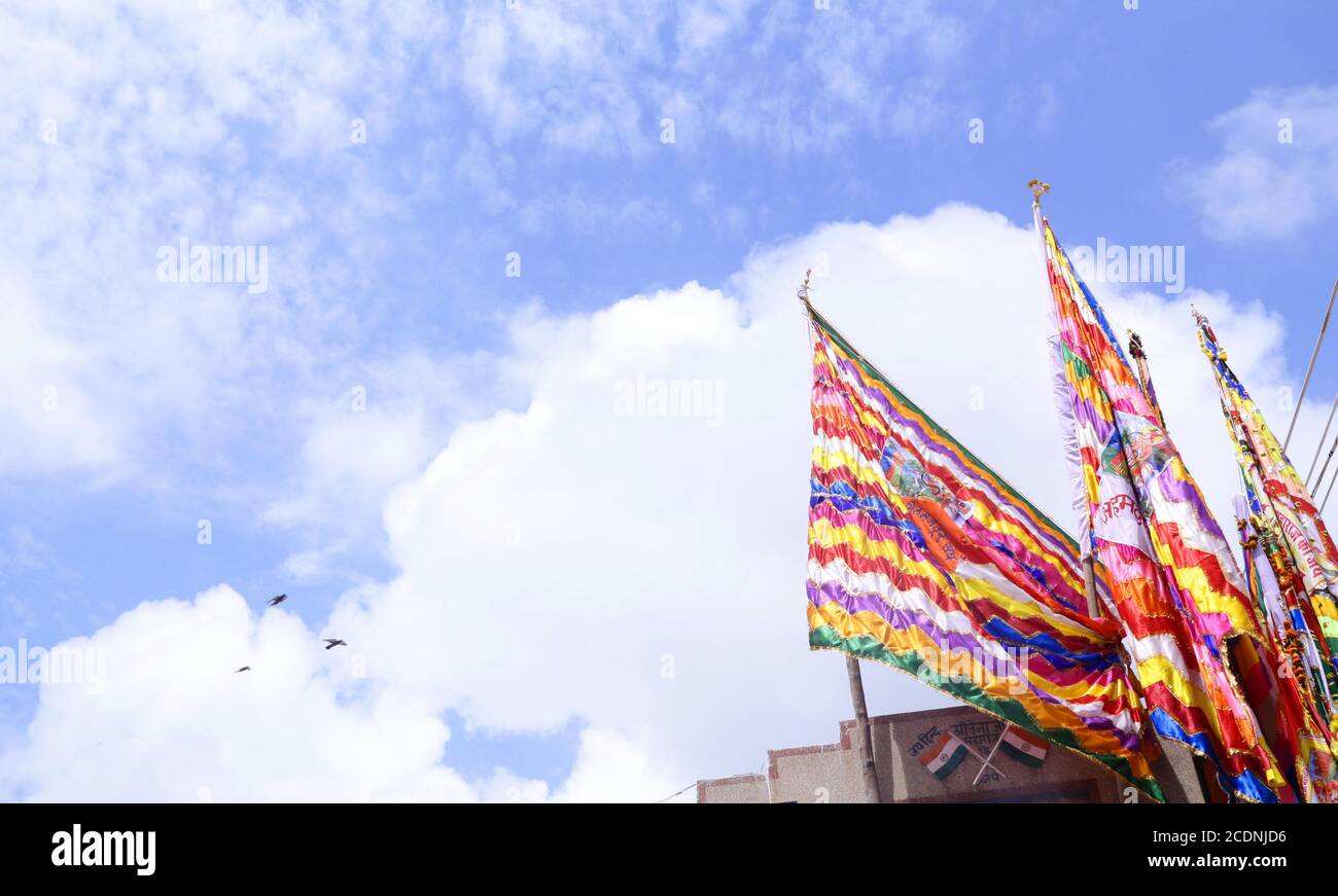 Beawar, Rajasthan, India, Aug 28, 2020: Colorful religious flags waves ...