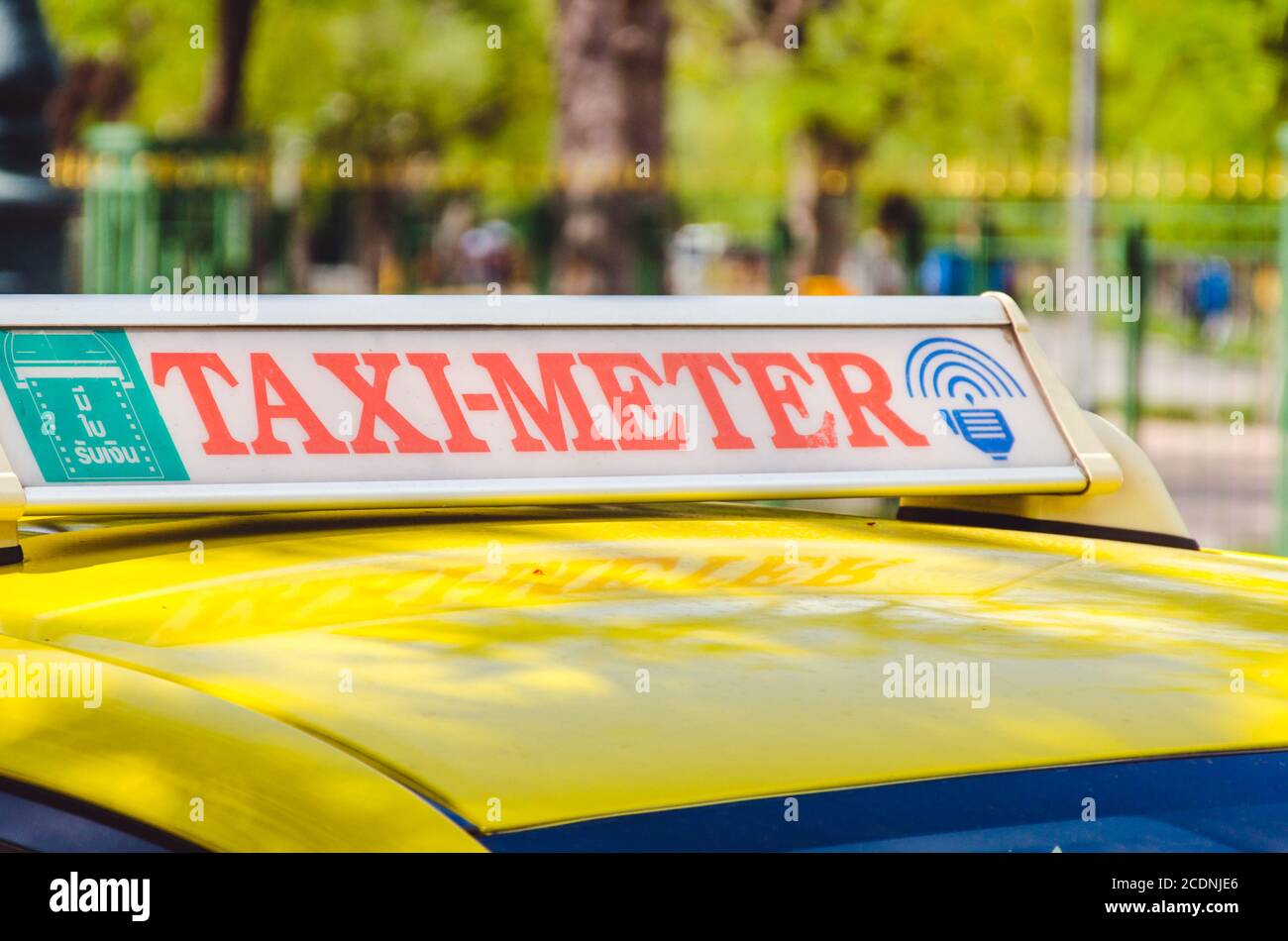 Signs metered taxi Stock Photo - Alamy